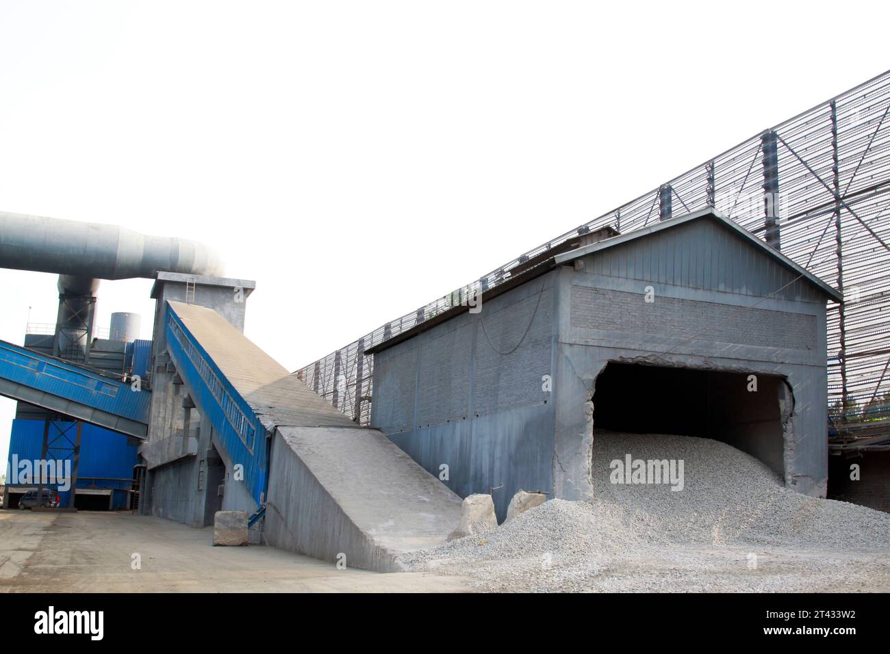 Stone raw materials warehouse in a factory Stock Photo - Alamy