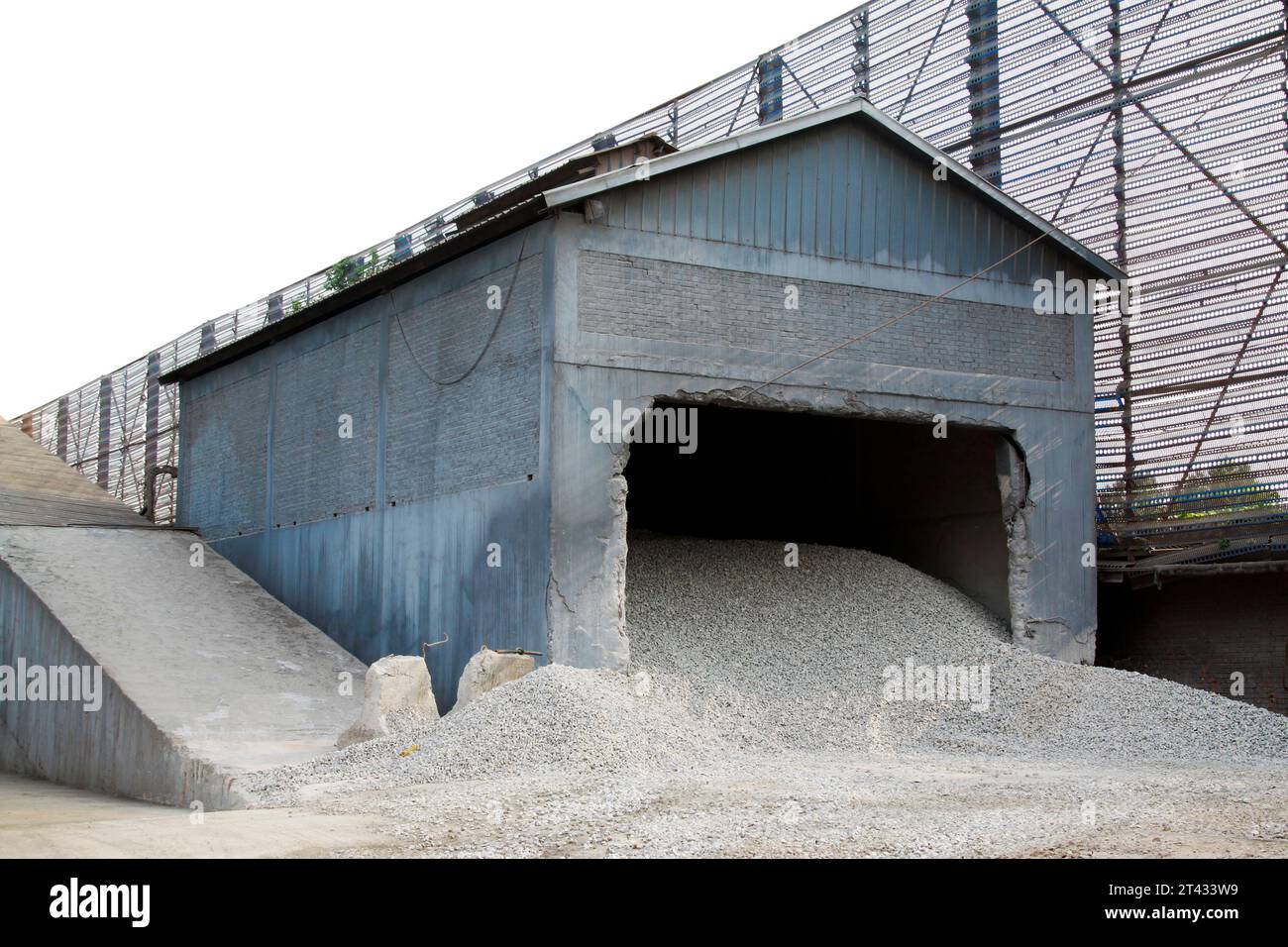 Stone raw materials warehouse in a factory Stock Photo - Alamy