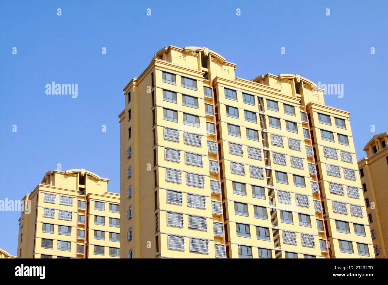high rise buildings in the blue sky, closeup of photo Stock Photo - Alamy