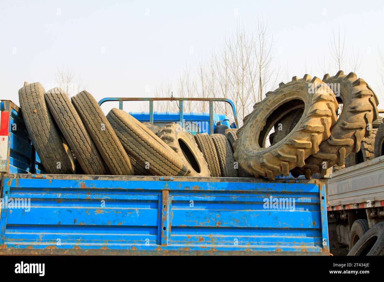 waste tyre in carriage, closeup of photo Stock Photo - Alamy
