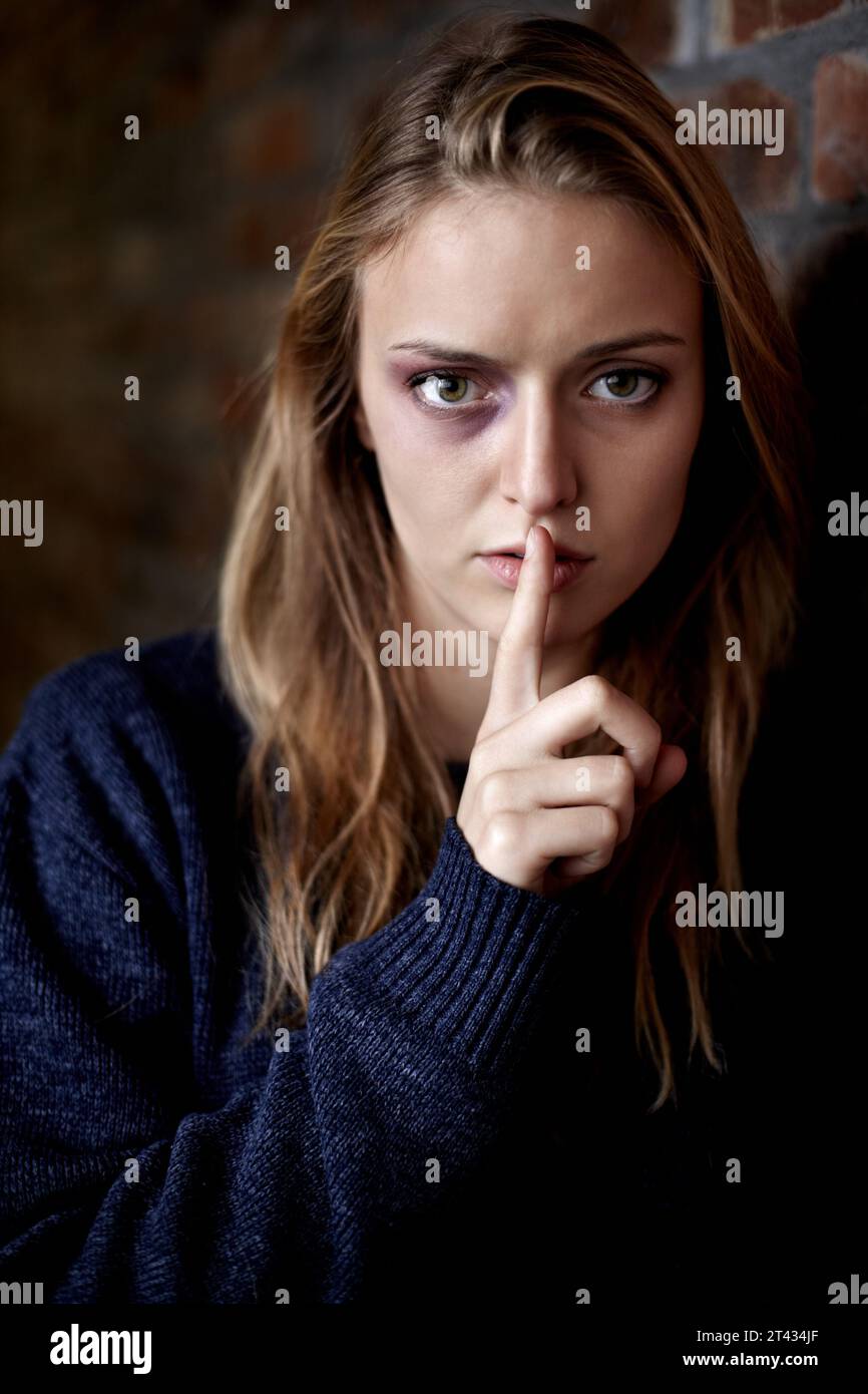 Portrait, finger on the lips and woman with abuse, scared and fear with ...