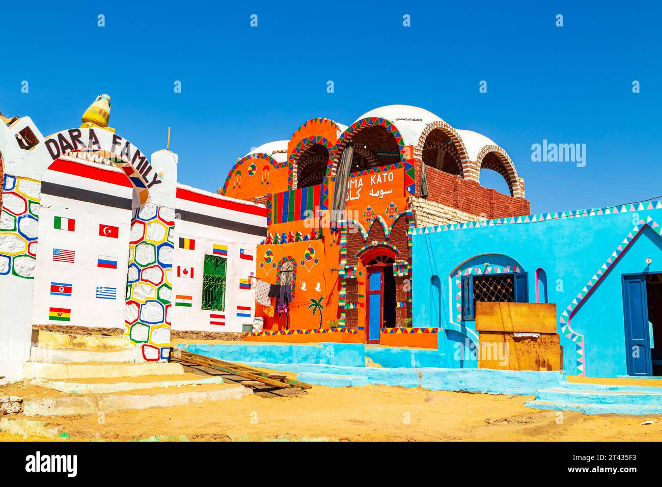 Colorful bright houses of the famous Nubian village. Aswan, Egypt ...