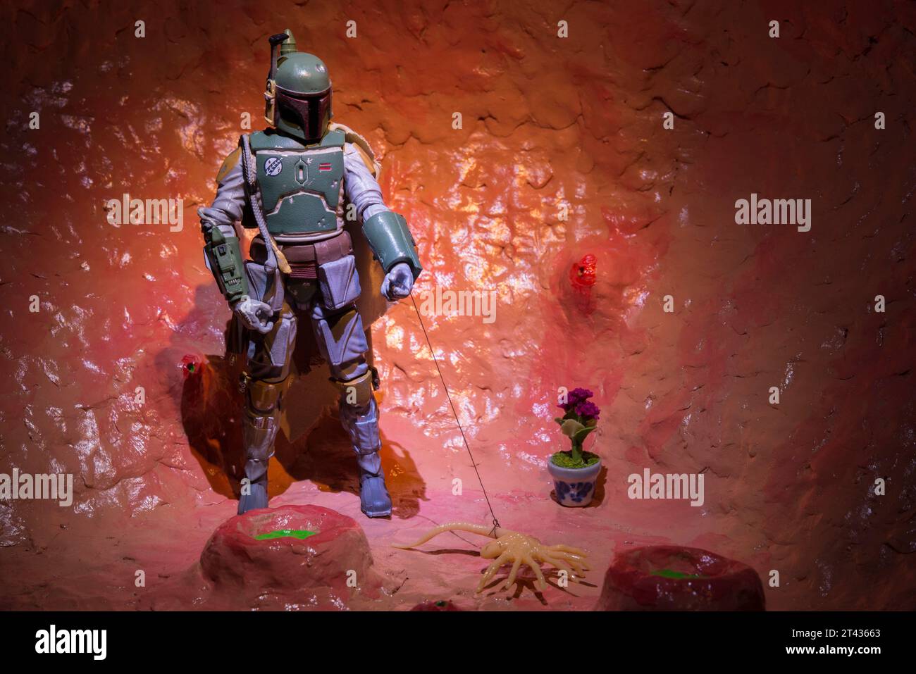 Boba Fett taking his pet facehugger for a walk Stock Photo - Alamy