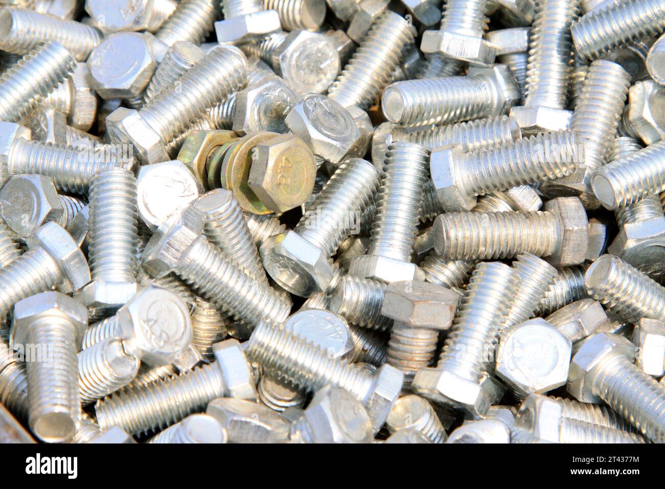 bolts piled up together, closeup of photo Stock Photo - Alamy