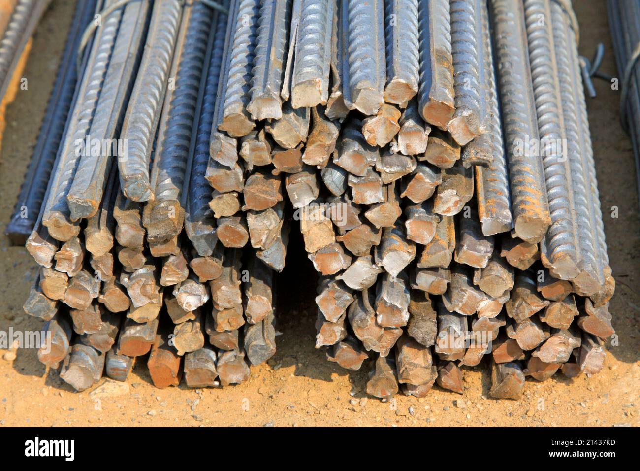 cross sectional rusty high tensile steel bar in a construction site ...