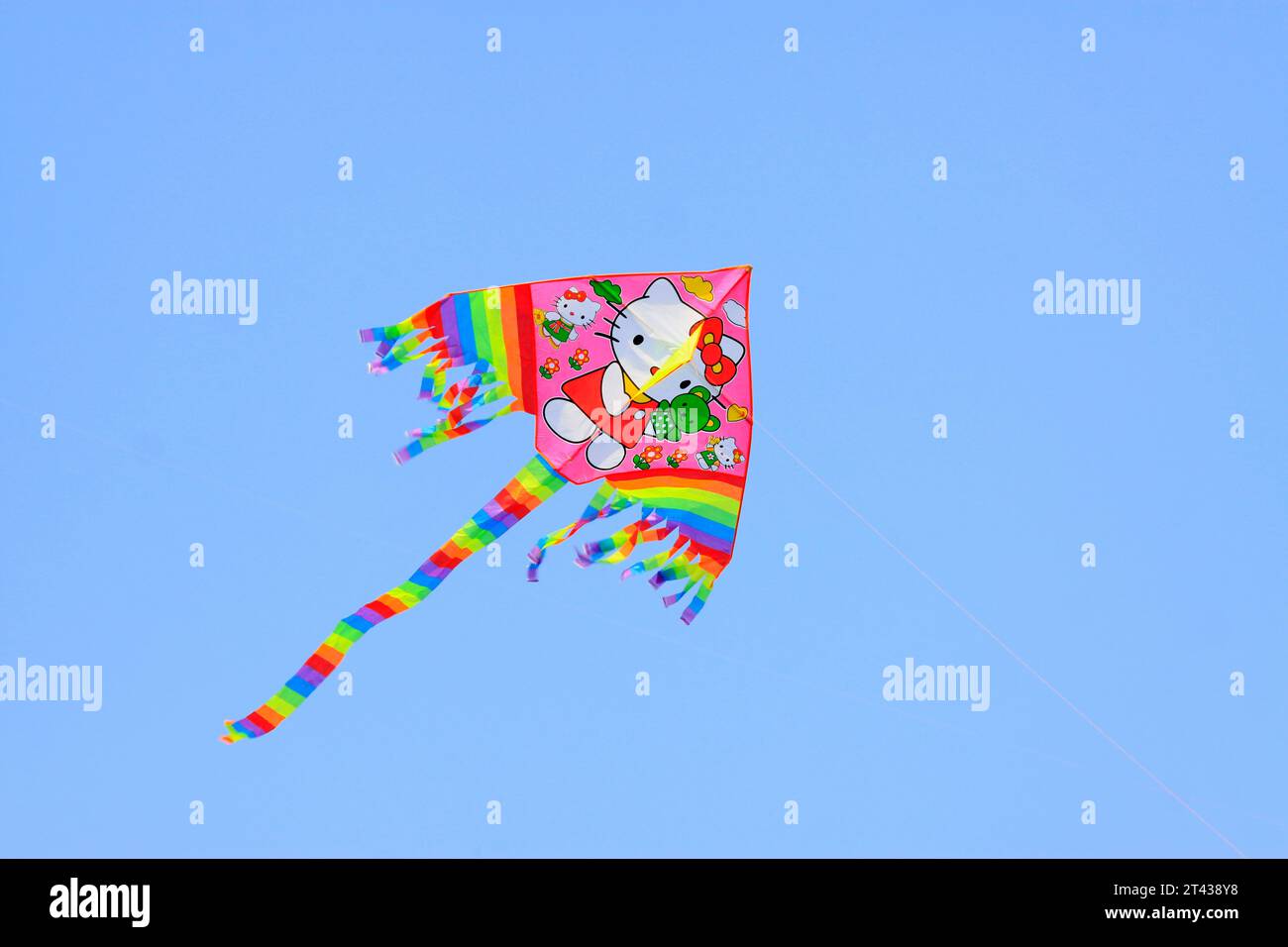 Cartoon characters modelling kite in the sky Stock Photo - Alamy