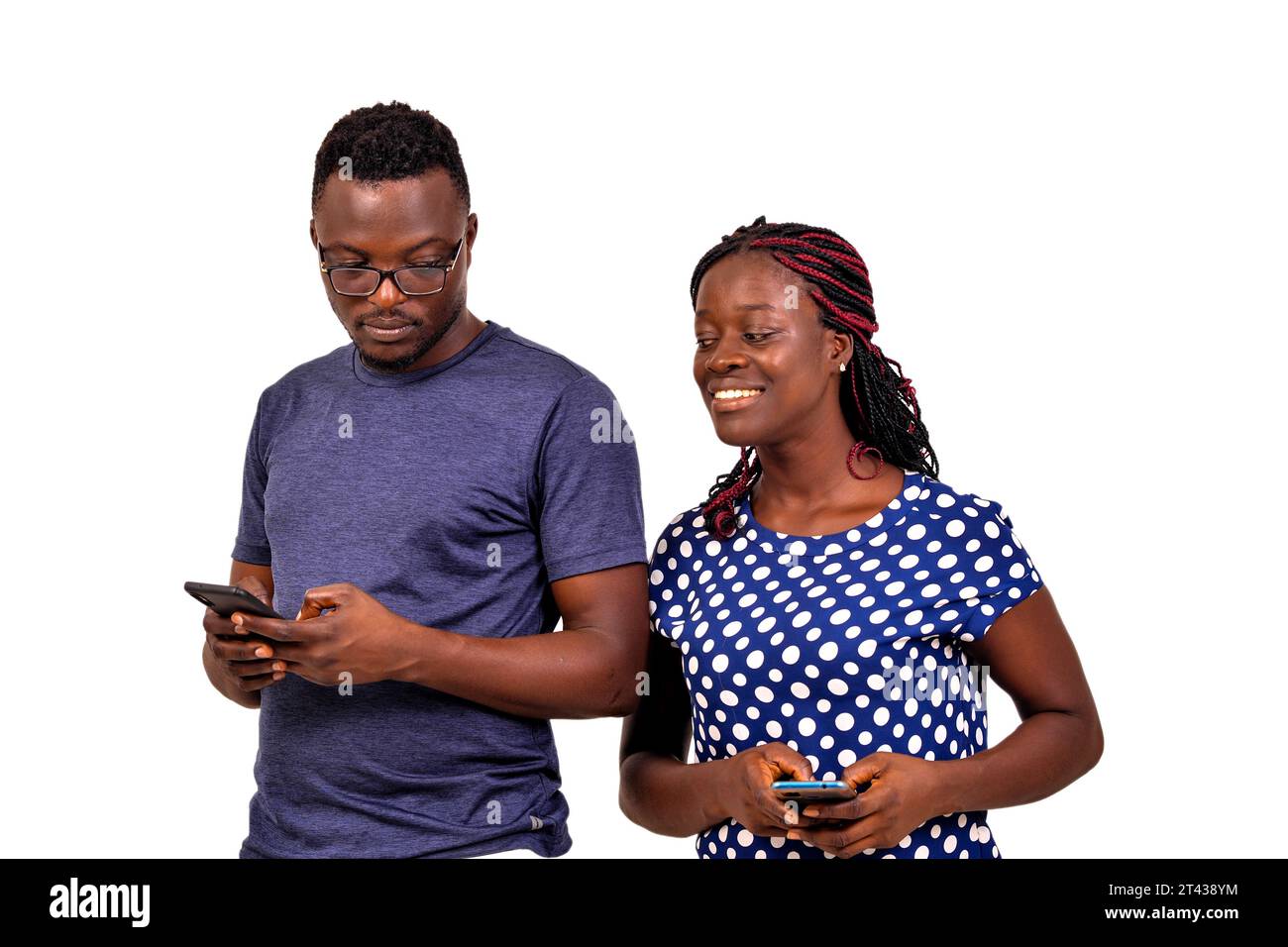 Image of curious young woman using a mobile phone and spying on her ...