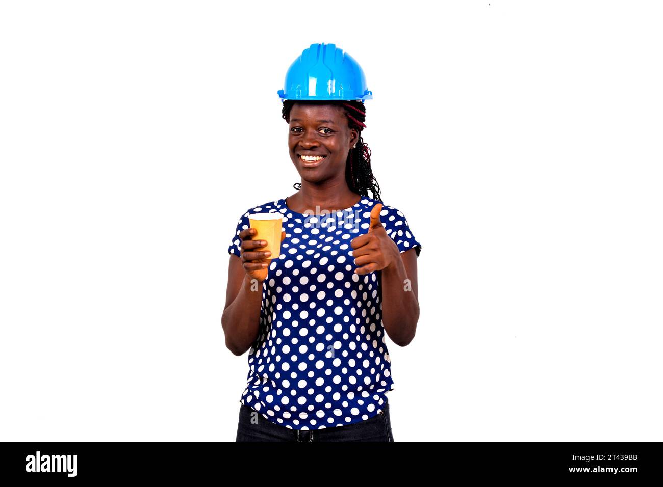 beautiful young female construction engineer wearing blue safety helmet ...