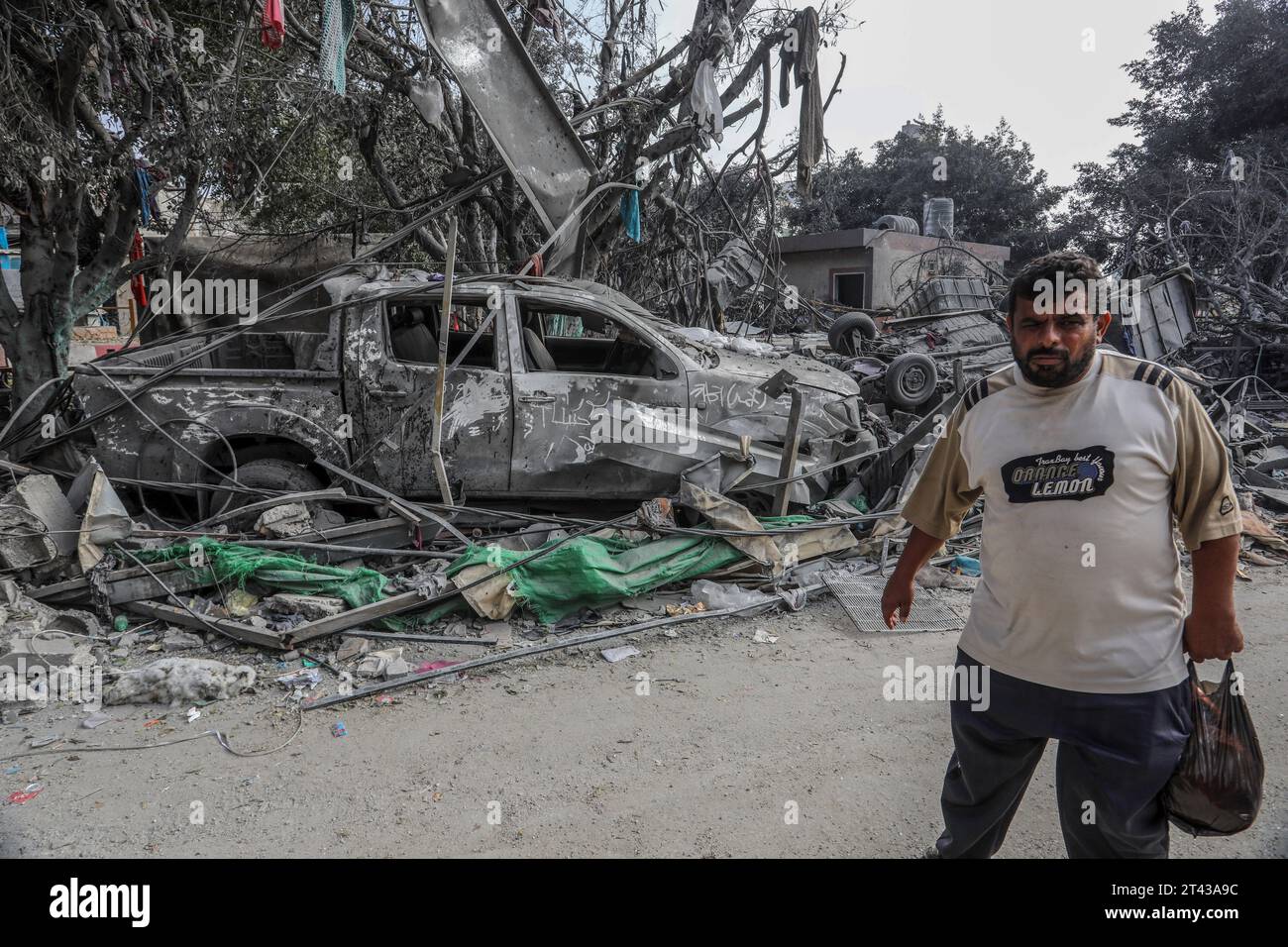 Rafah, Palestinian Territories. 28th Oct, 2023. Palestinian walks past ...