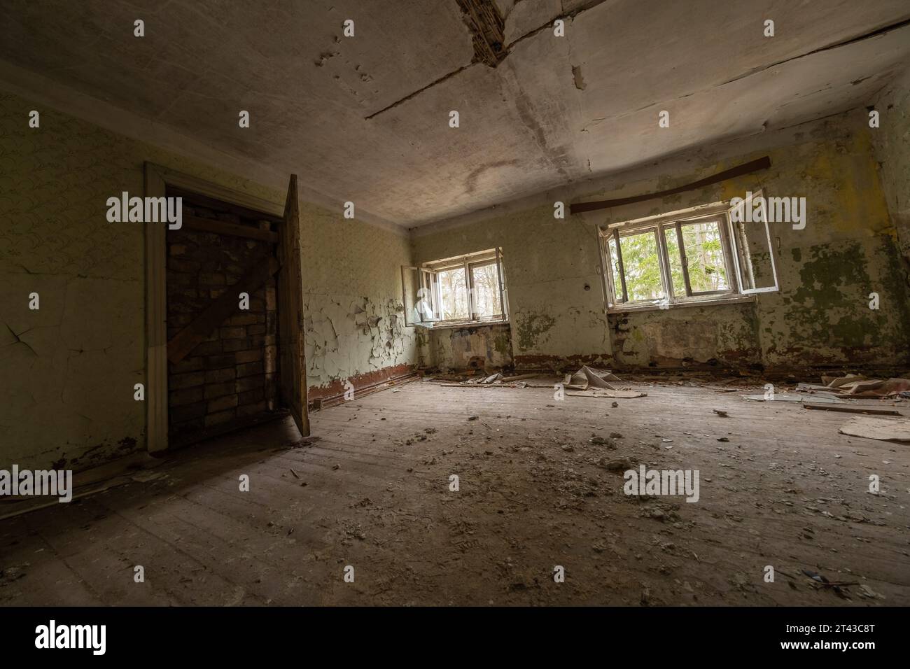 Interior of shabby abandoned house hall with rubbish dirty uncleaned ...