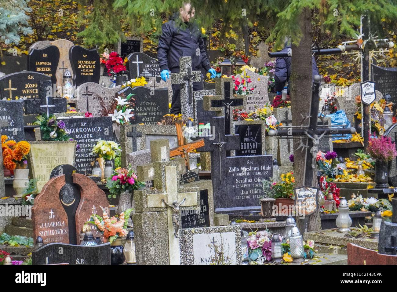 Gdansk, Poland. 28th Oct, 2023. Graves with catholic crosses decorated ...