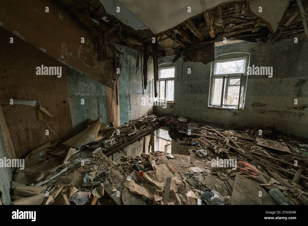From above of interior of spacious hall with glass windows heap of ...