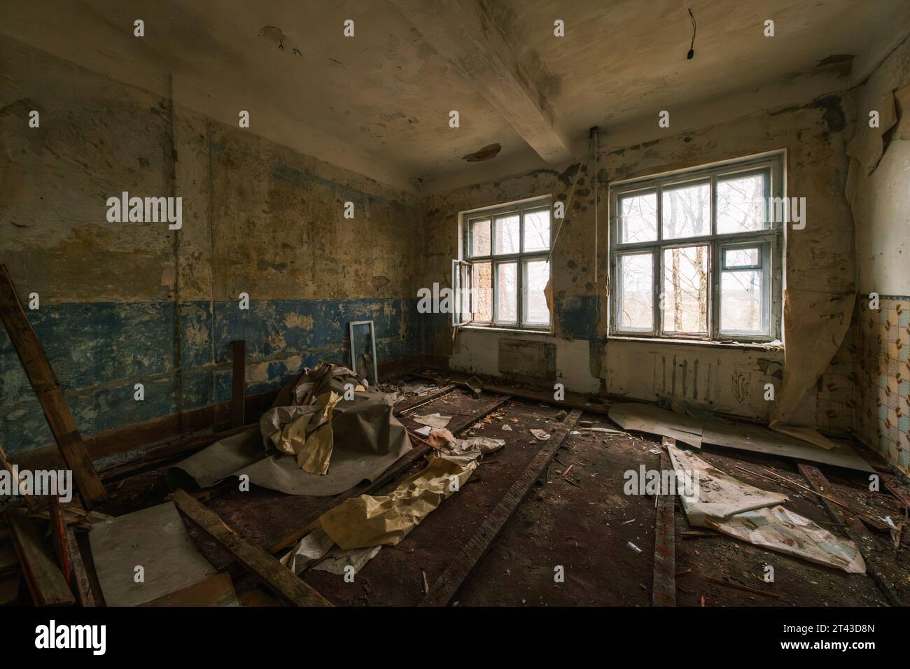 Interior of abandoned shabby dirty spacious bedroom with wooden ...