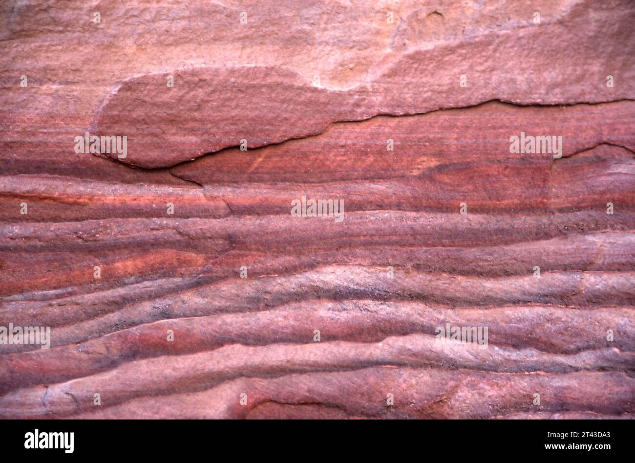 Red rock stone sand texture background. Red Stone wall in Petra, Jordan ...