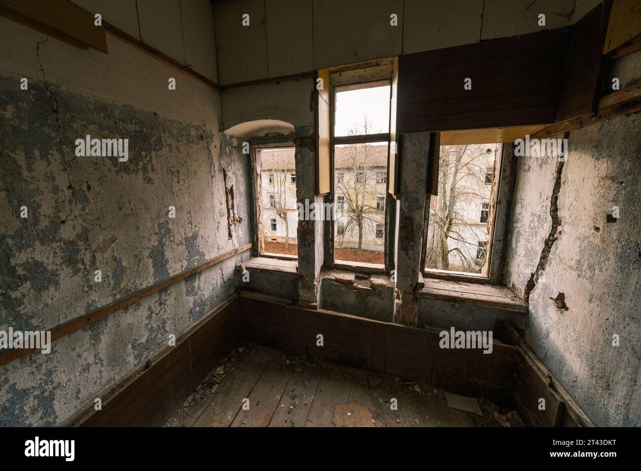 From above view of interior of room with wooden floor structure shabby ...
