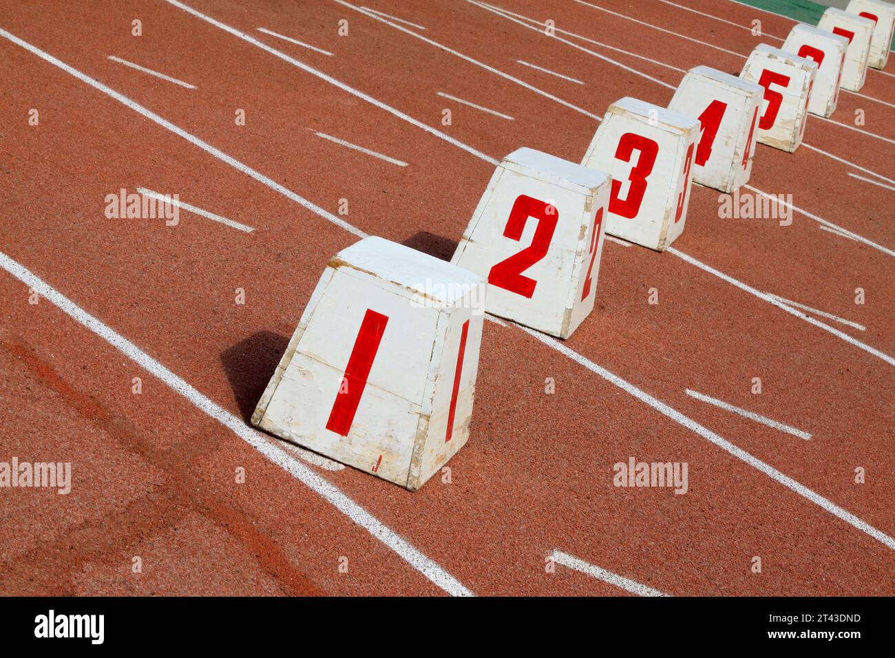 Wooden track number on plastic runway in a sports ground Stock Photo ...