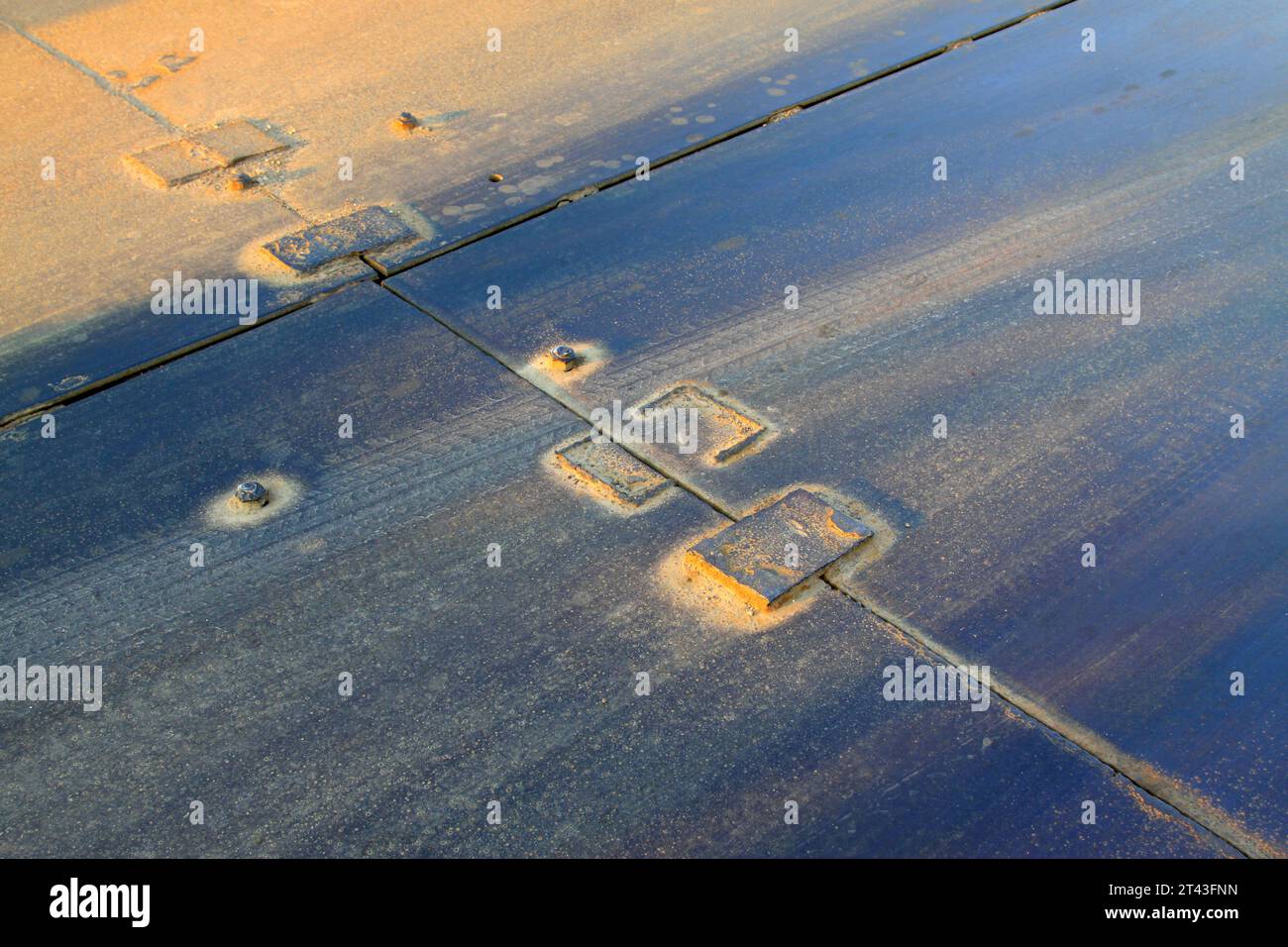 patch on steel plate, closeup of photo Stock Photo - Alamy