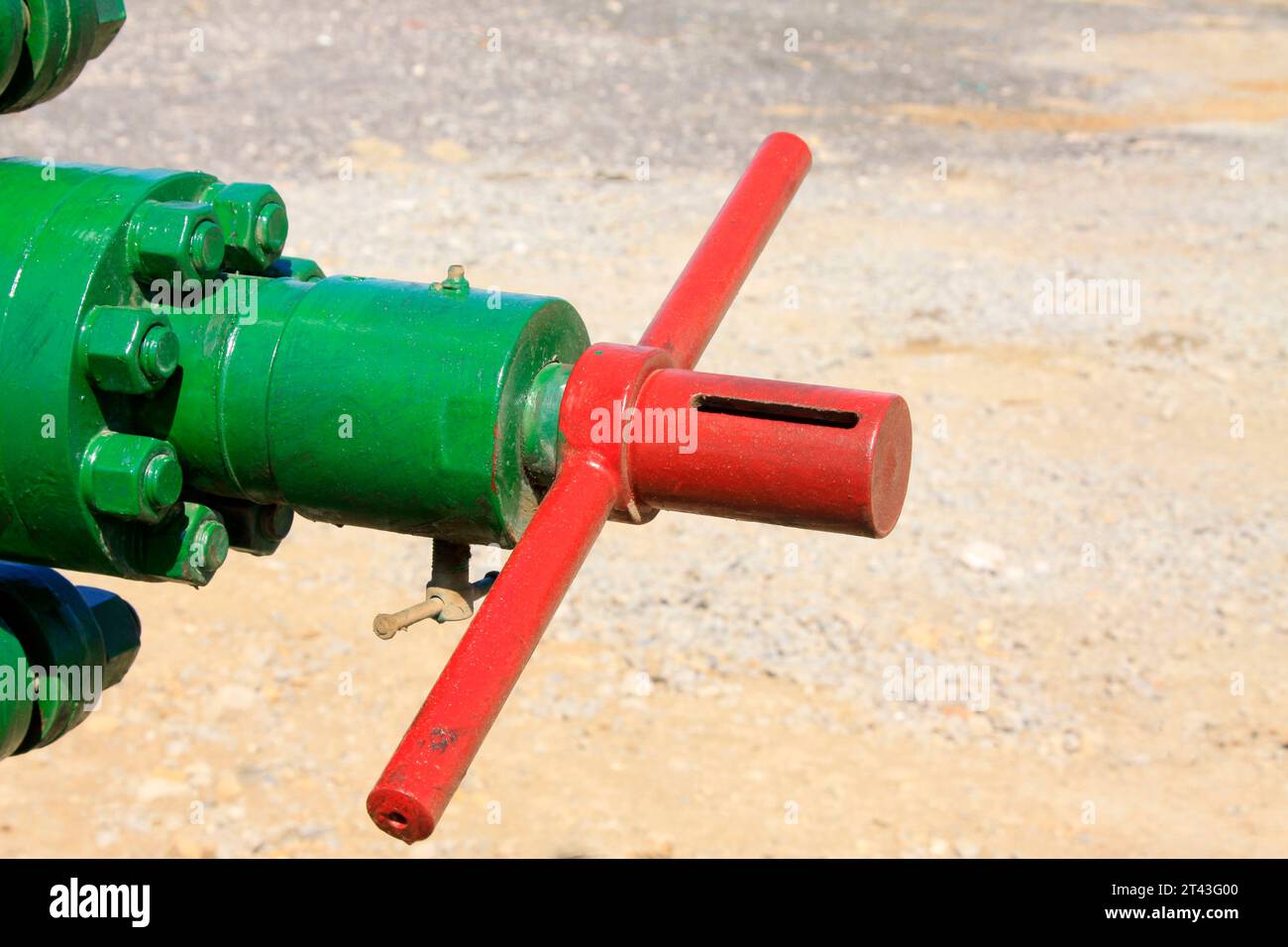 green oil pipeline and red bolt rod, closeup of photo Stock Photo - Alamy