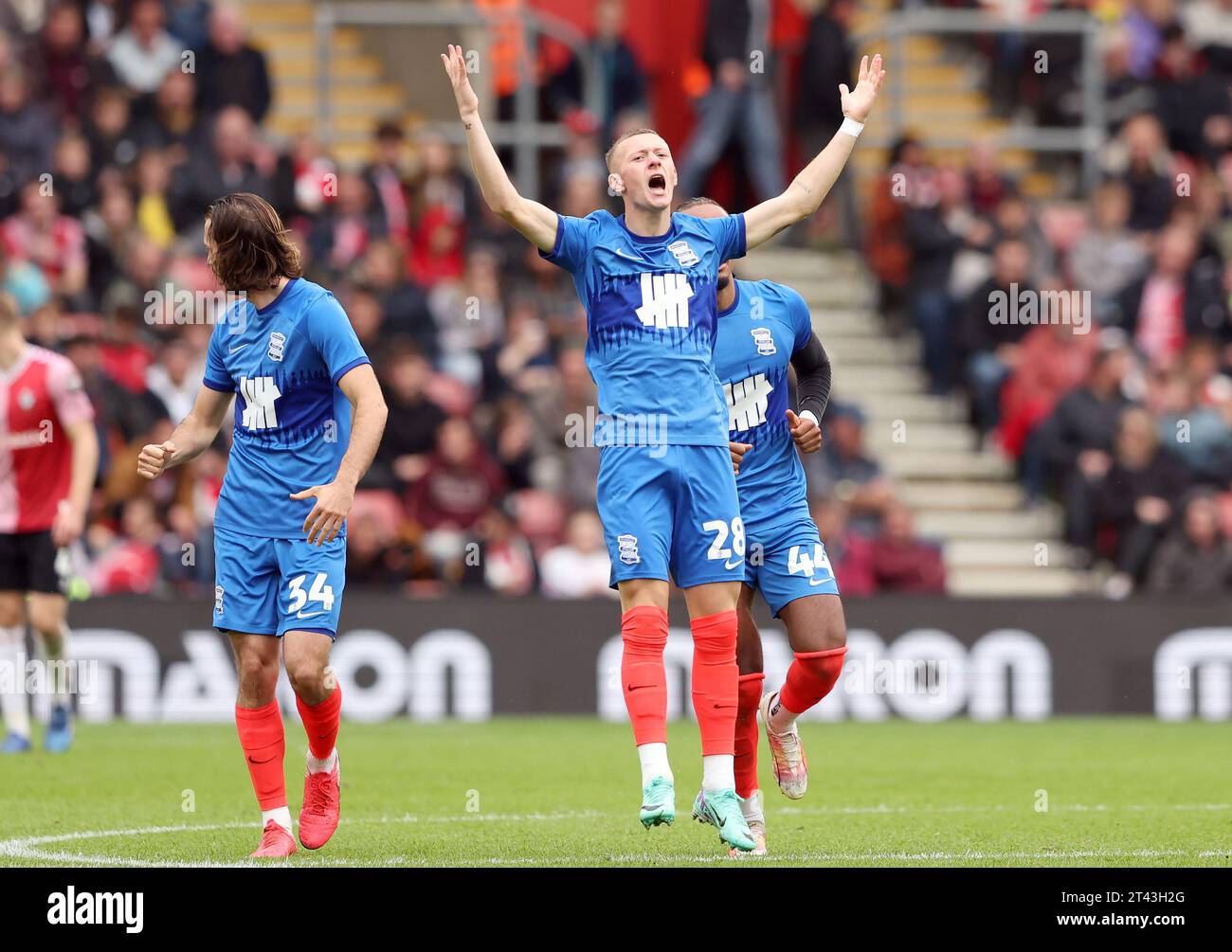 Birmingham City's Jay Stansfield (centre) celebrates scoring his sides ...