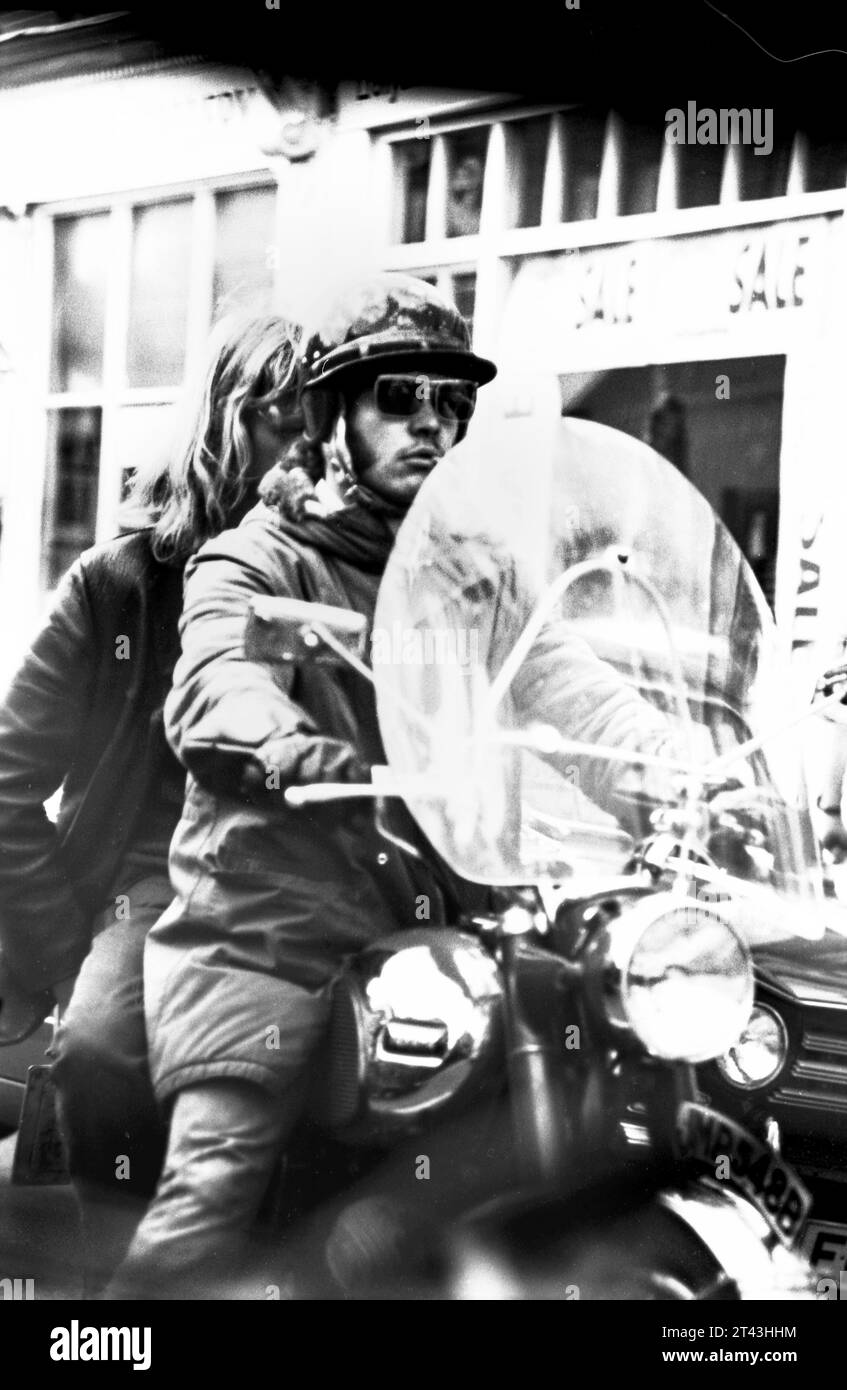 Couple on motorcycle, London, England, 1971 Stock Photo - Alamy