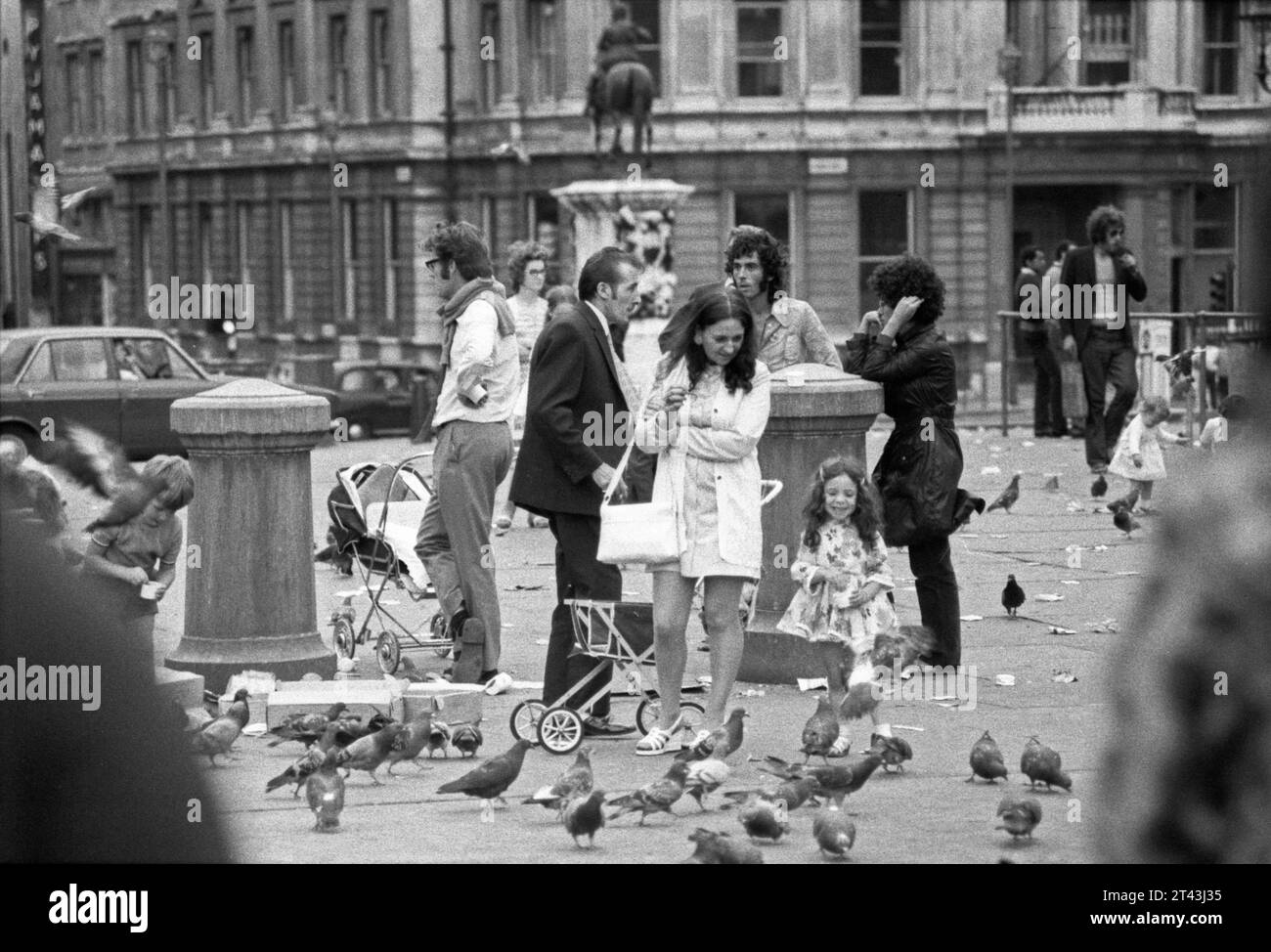 People have fun in the square, London, England, 1971 Stock Photo - Alamy