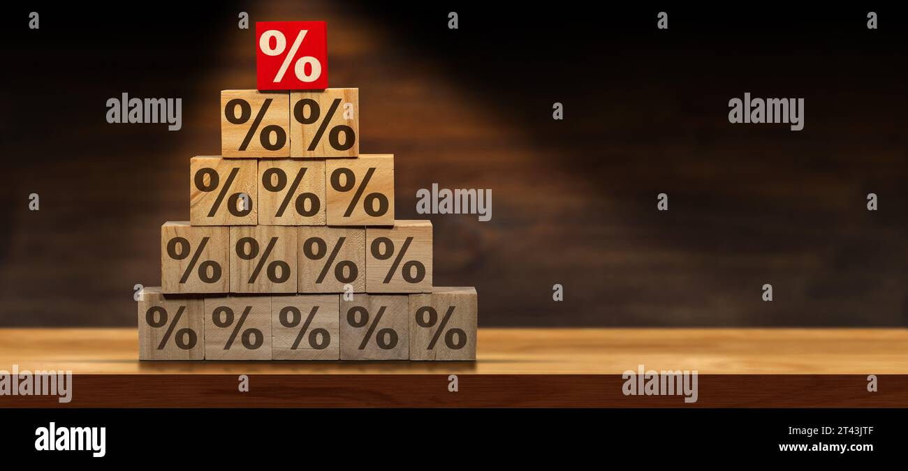 Stack of wooden blocks forming a pyramid, with many brown percentage ...