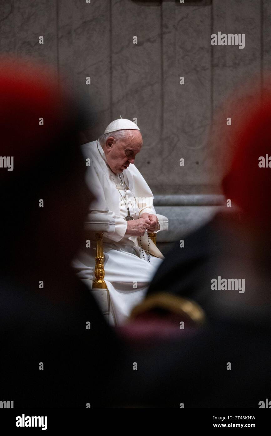 Pope Francis, framed by cardinals attend a prayer service for Peace ...