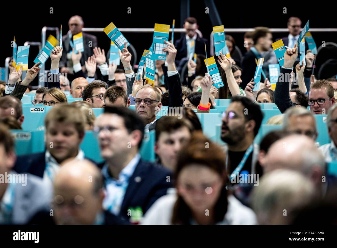 28 October 2023, North Rhine-Westphalia, Hürth: CDU members hold up ...