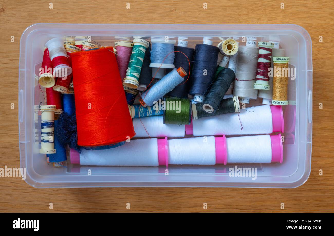 A box of various thread spools for sewing Stock Photo - Alamy