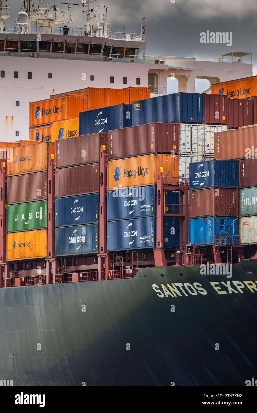 A container ship with container on the Panama Canal, side view, showing ...
