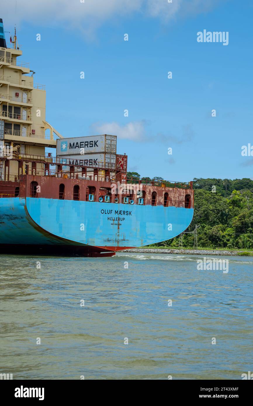 A container ship with container on the Panama Canal, view from the rear ...