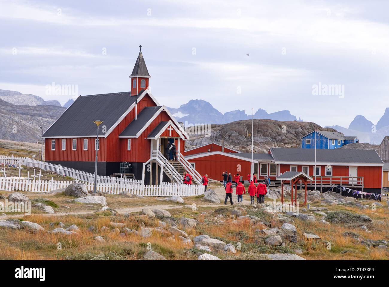 Greenland tourism; a group of Arctic Cruise tourists visiting a Church ...