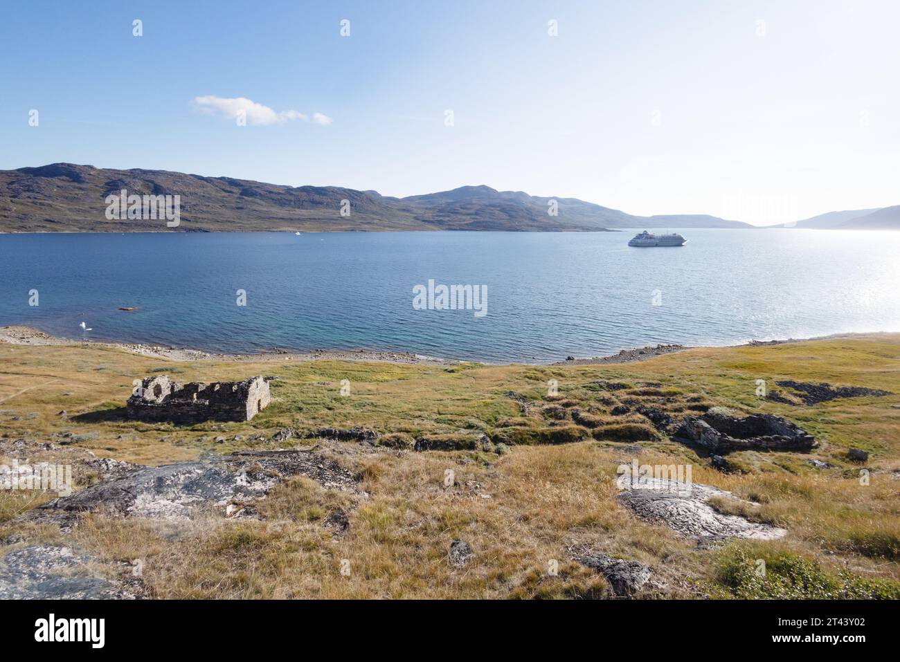 Arctic cruise - a cruise ship moored off Hvalsey, Greenland. Landscape ...