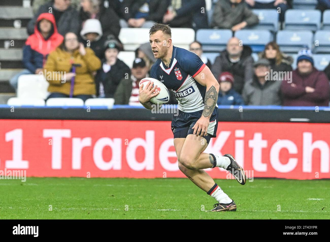 Tom Johnstone of England in actionduring the Rugby League International ...