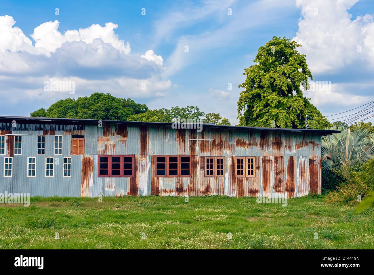 Facade house with old zinc wall. Beautiful vintage galvanized sheet ...