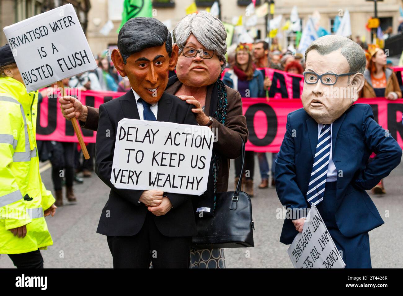 Bath, UK. 28th Oct, 2023. Climate-change climate activists dressed up ...