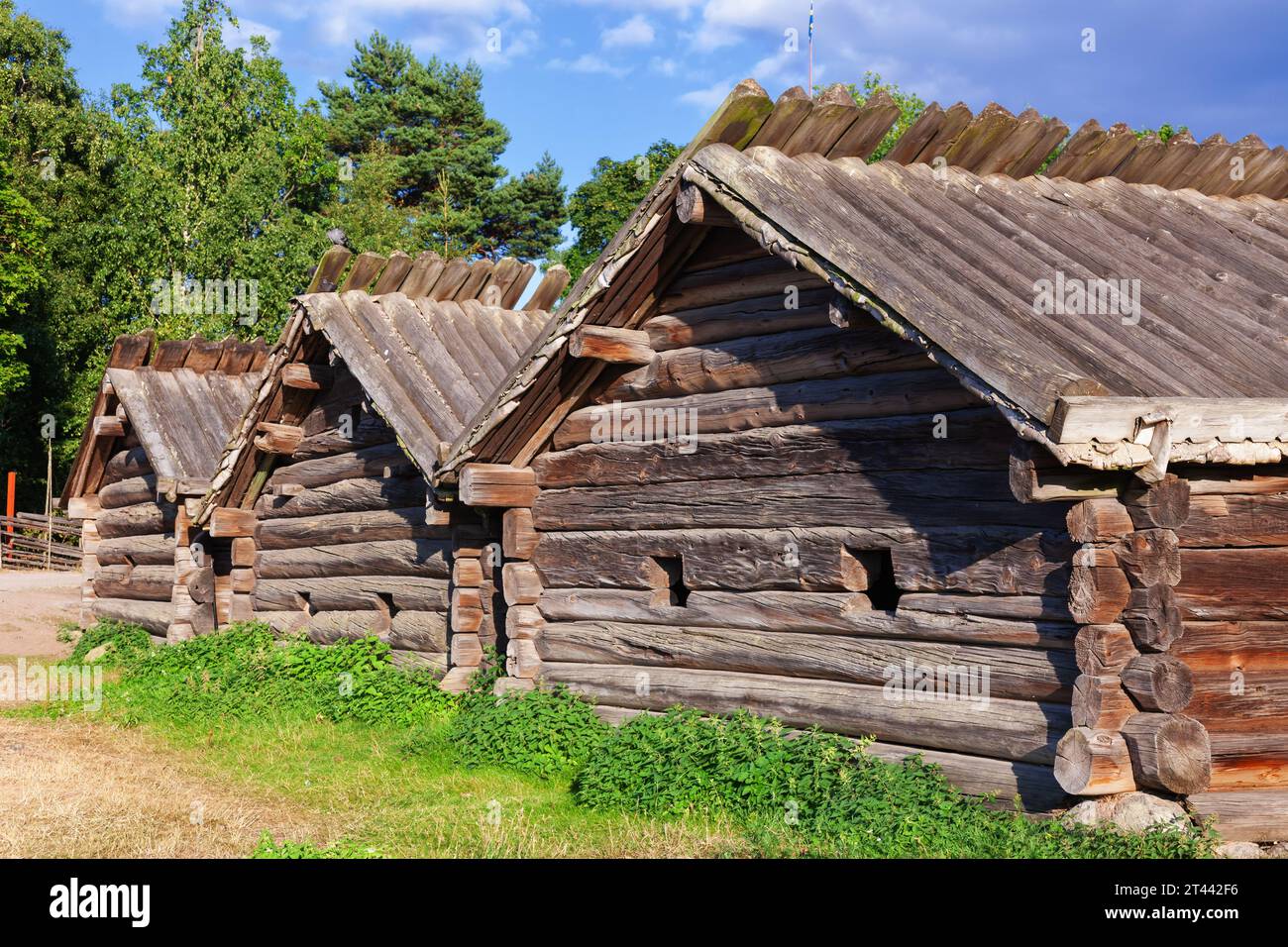 Preserved traditional wooden store houses in Skansen, the oldest open ...