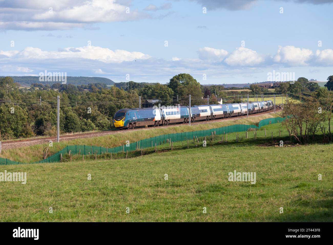 Avanti West Coast Alstom Pendolino train tilting round a curve in the ...