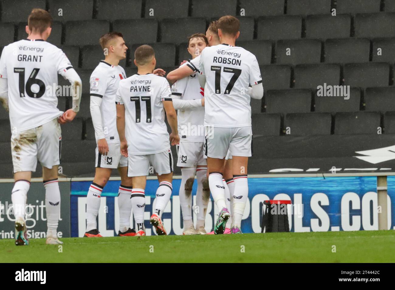 Max Dean celebrates after scoring for Milton Keynes Dons, to take the ...