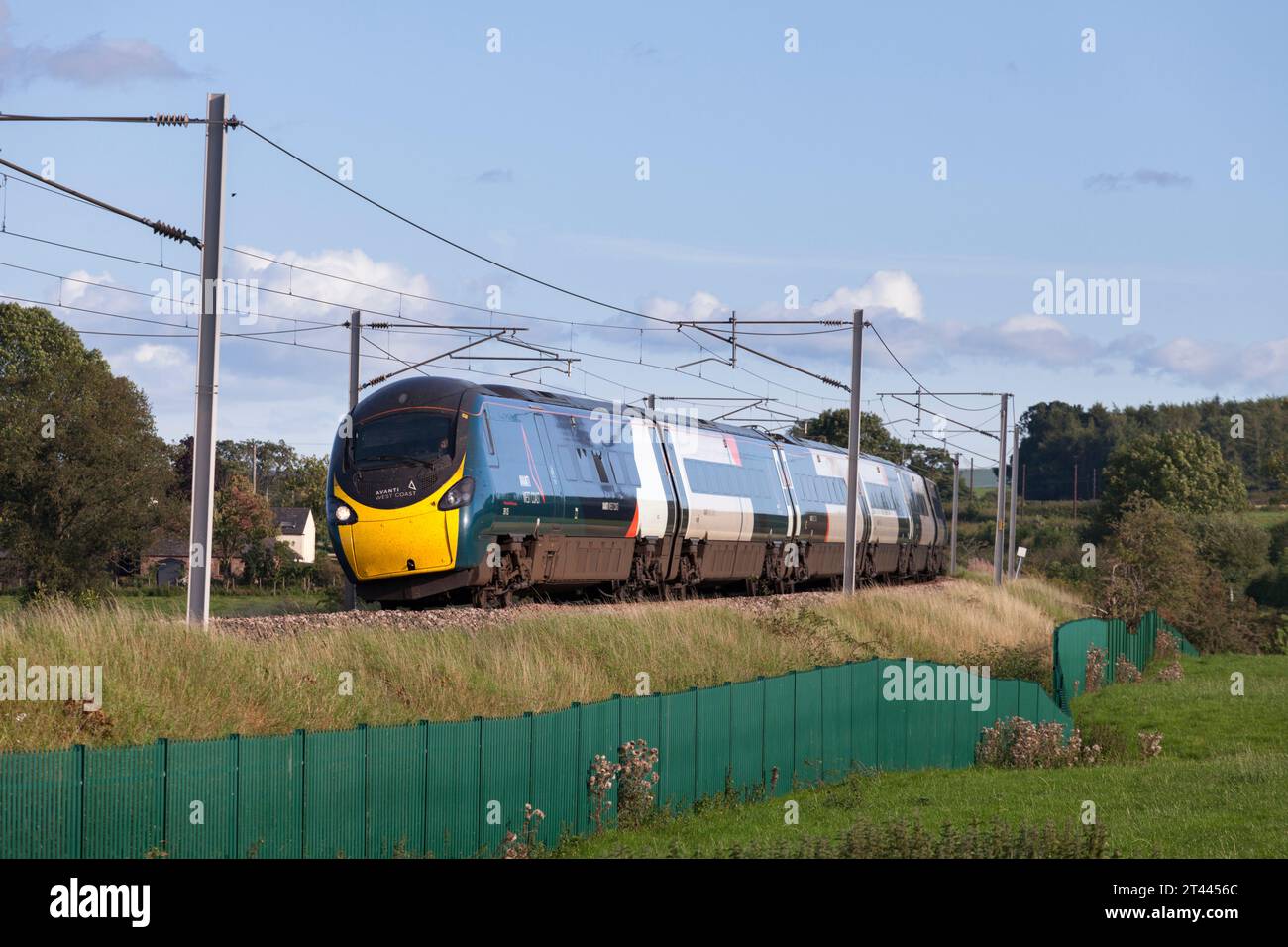 Avanti West Coast Alstom Pendolino train tilting round a curve in the ...