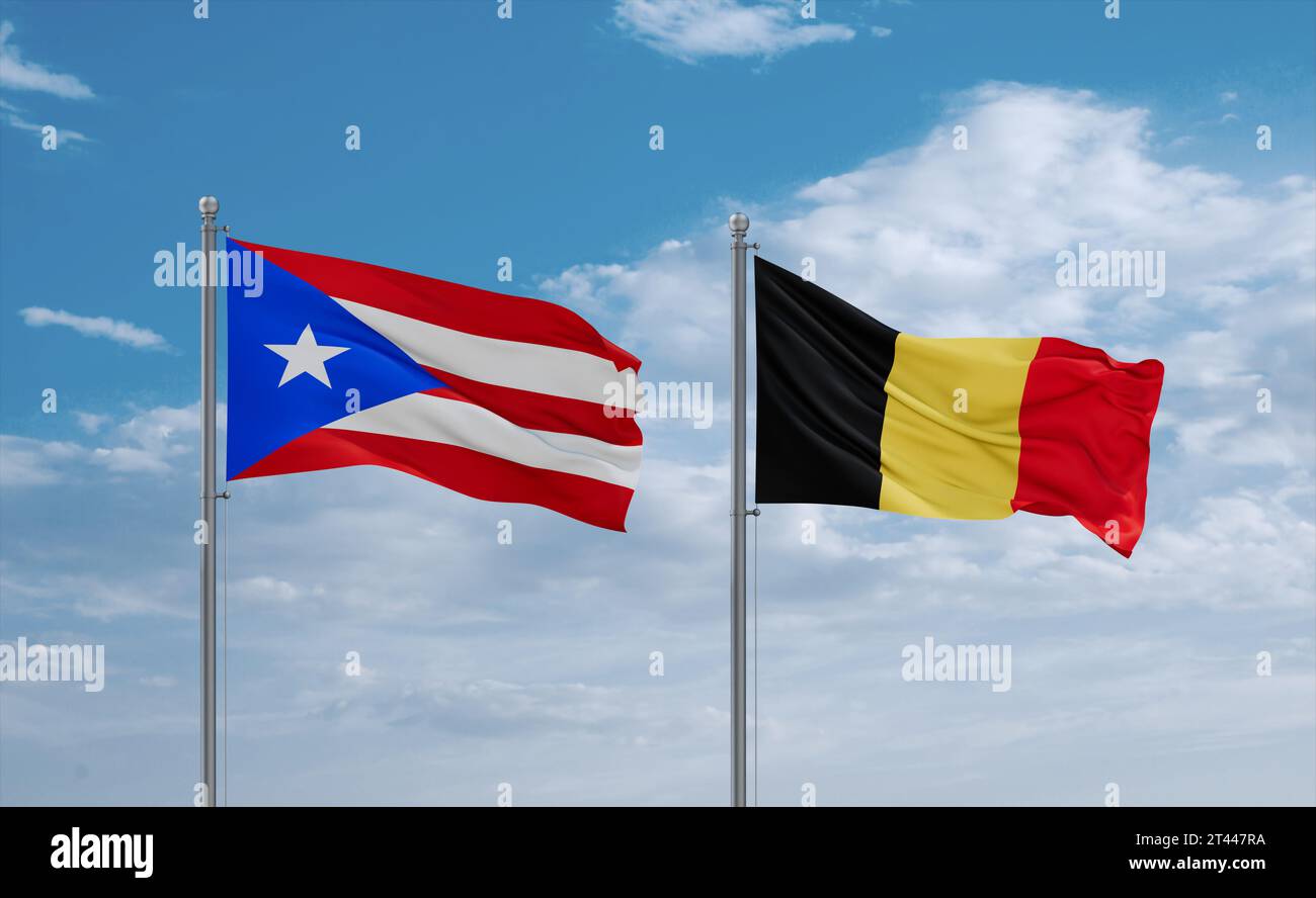 Belgium and Puerto Rico flags waving together on blue cloudy sky, two ...
