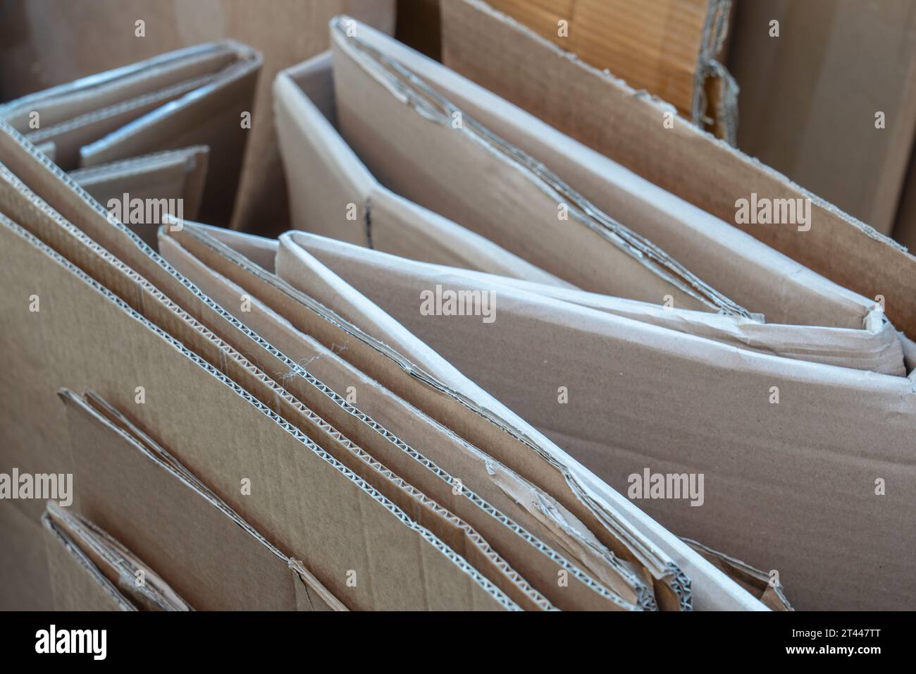 Packaging cardboard in a recycling back sent to recycling Stock Photo ...