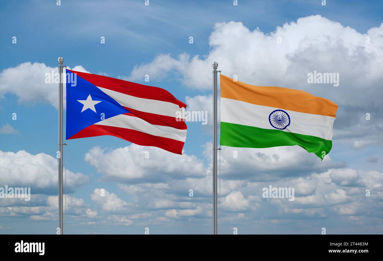 India and Puerto Rico flags waving together on blue cloudy sky, two country relationship concept ...