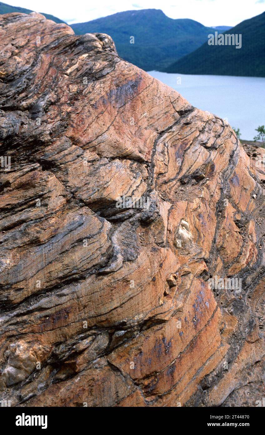 Schist is a metamorphic rock with foliation (schistose texture). This ...