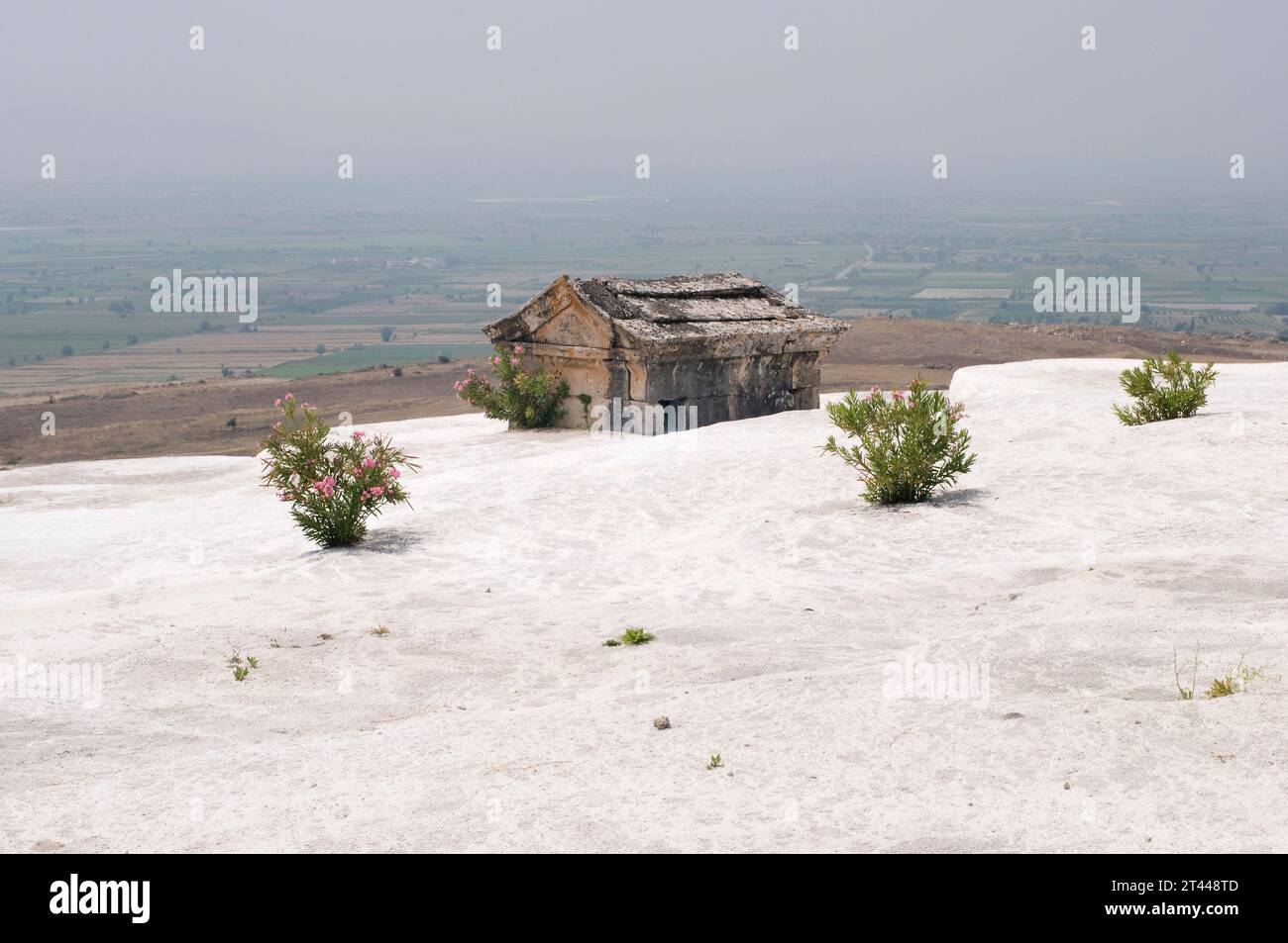 Travertine surrounding a roman tomb in Pamukkale hot springs, Turkey ...