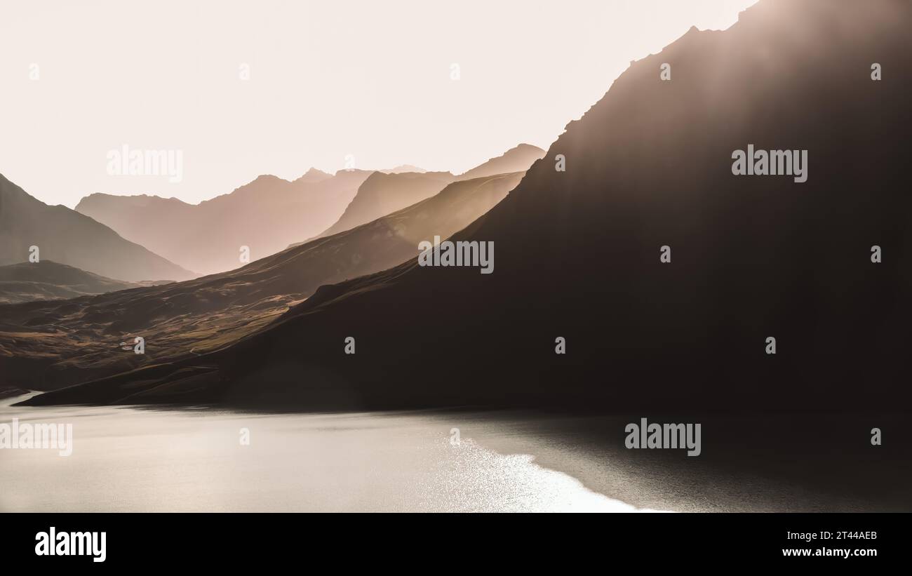 A monochrome landscape photo of a lake in the French Alps, mountain ...