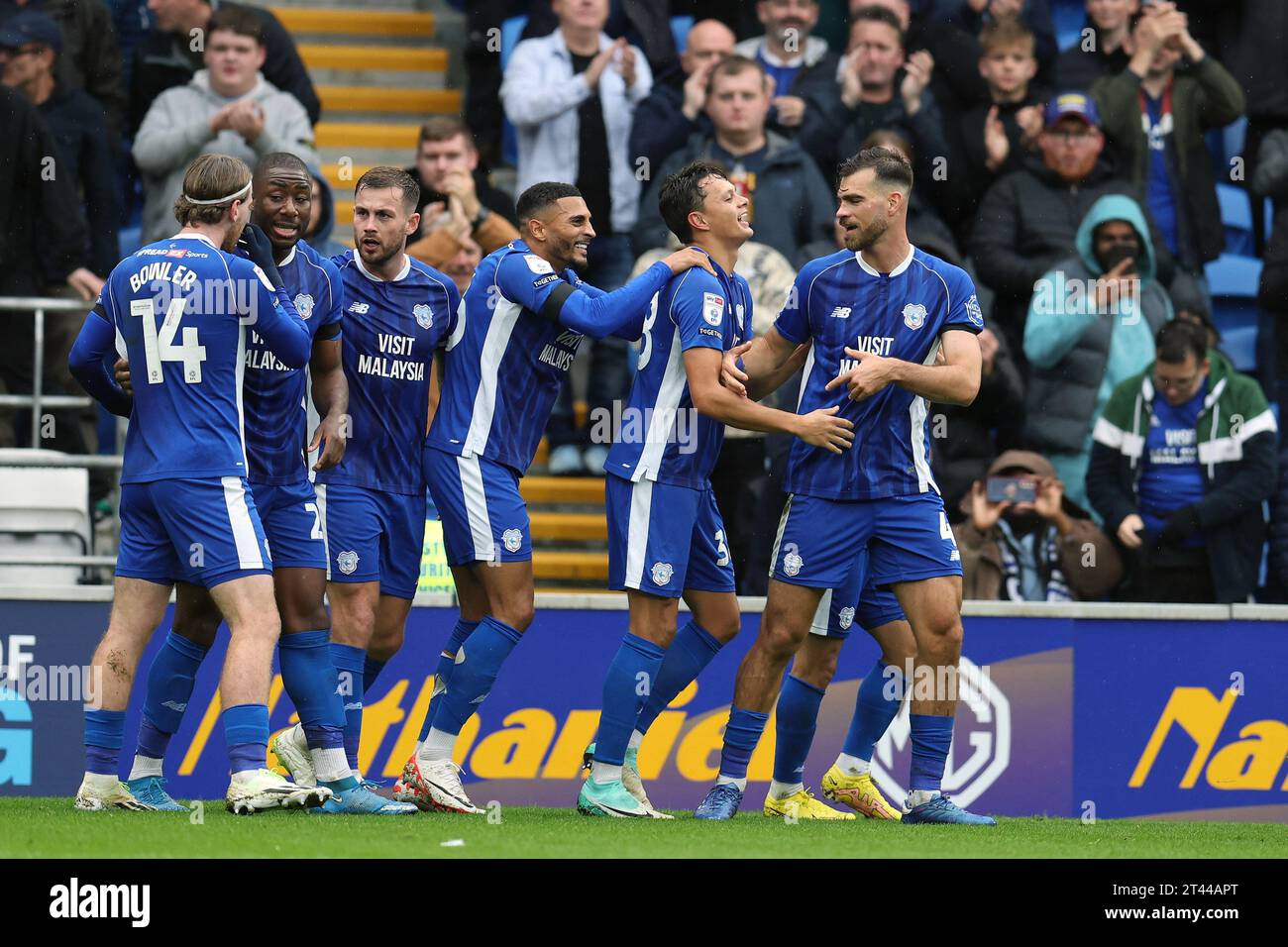 Cardiff, UK. 28th Oct, 2023. Perry NG of Cardiff city (2 R) celebrates ...