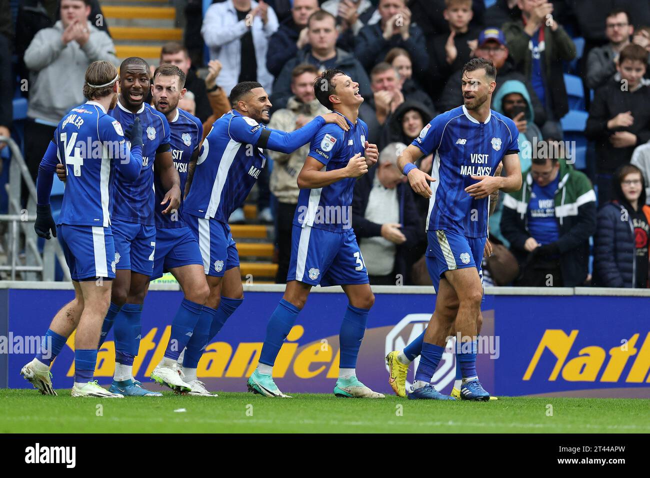 Cardiff, UK. 28th Oct, 2023. Perry NG of Cardiff city (2 R) celebrates ...