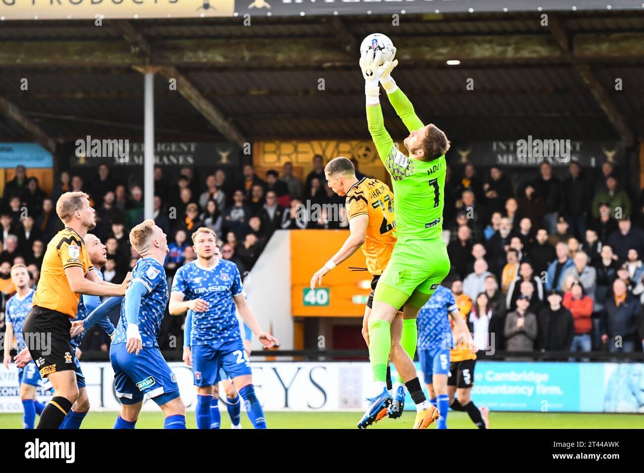 Goalkeeper Tomas Holy (1 Carlisle United) challenged by Gassan Ahadme ...