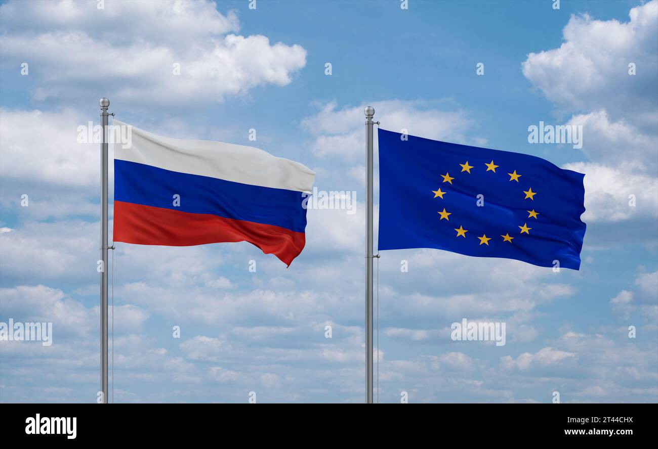 European Union and Russia flags waving together in the wind on blue ...